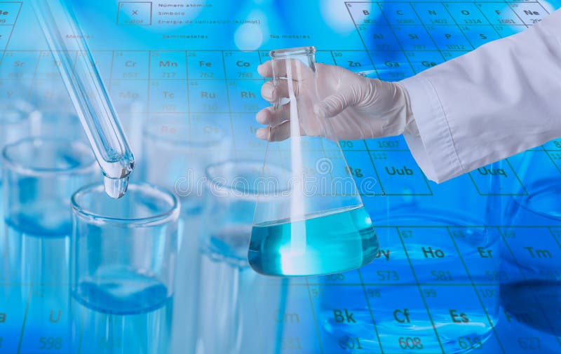 Scientist Holding Glass Flask with Liquid Stock Photo - Image of ...