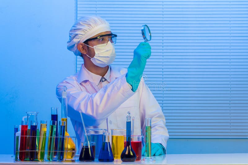Scientist Holding Magnifying Glass Stock Image - Image of expertise ...