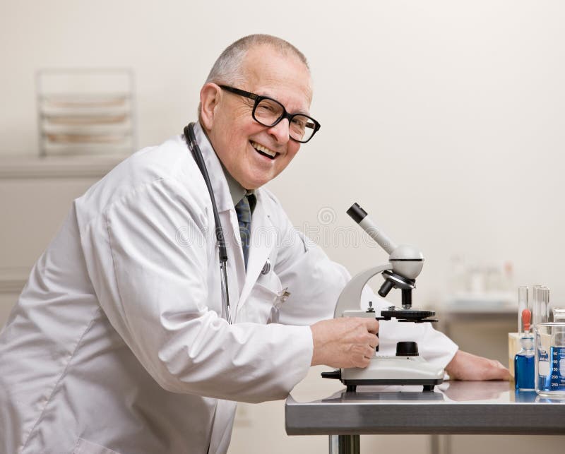 Scientist in Lab Coat with Microscope Stock Image - Image of scientist ...