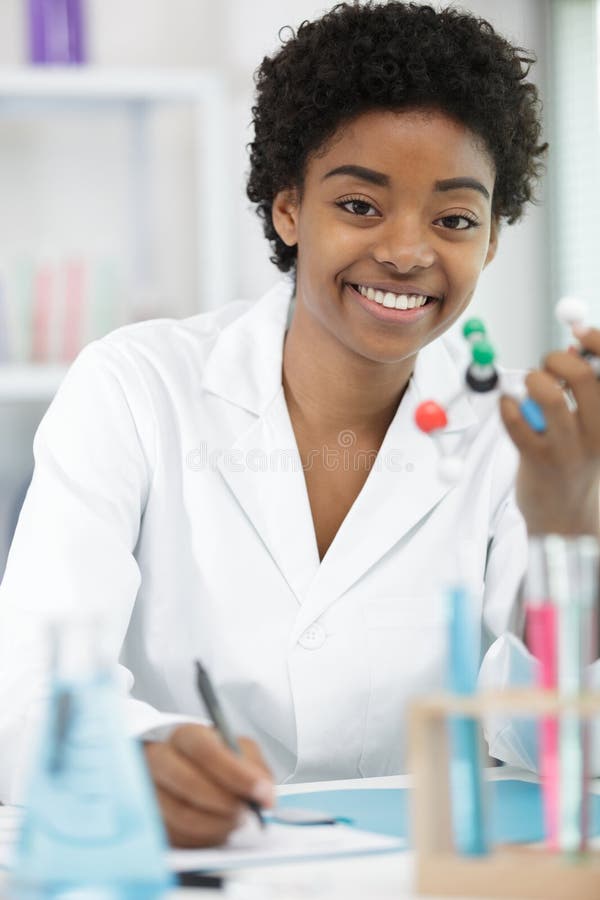 Scientist in Lab Coat and Protective Wear Works in Laboratory Stock ...