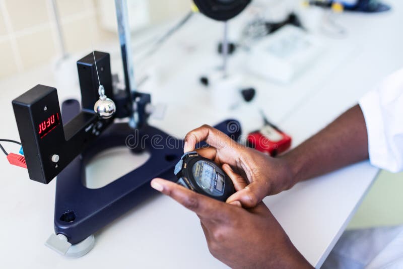 Scientist with Laboratory Clock and Timer Stock Image - Image of clock ...