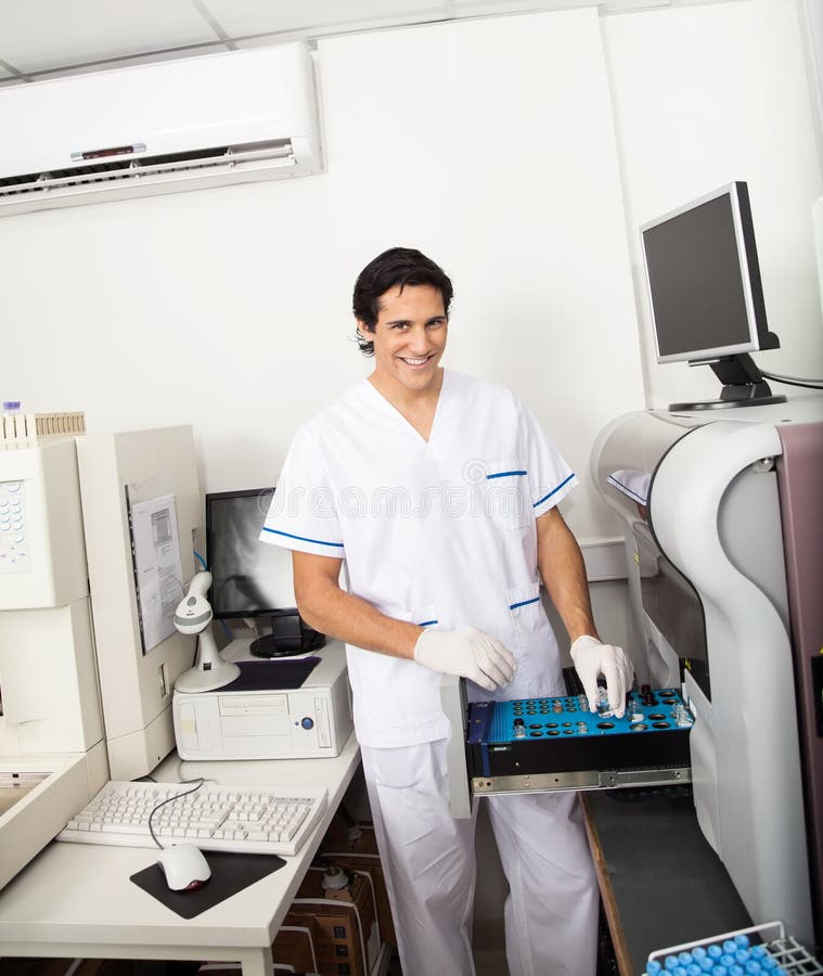 Scientist Loading Analyzer with Samples Stock Photo - Image of research ...