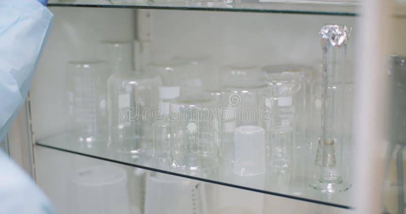 Scientist Looking for Flask at Laboratory Stock Video - Video of ...