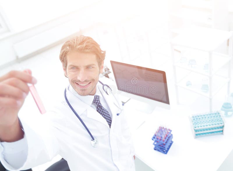 Man in Laboratory Checking Test Tubes Stock Image - Image of person ...