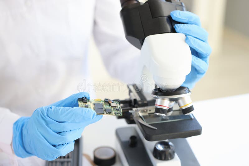 Scientist Looking Under Microscope Computer Processor Closeup Stock ...