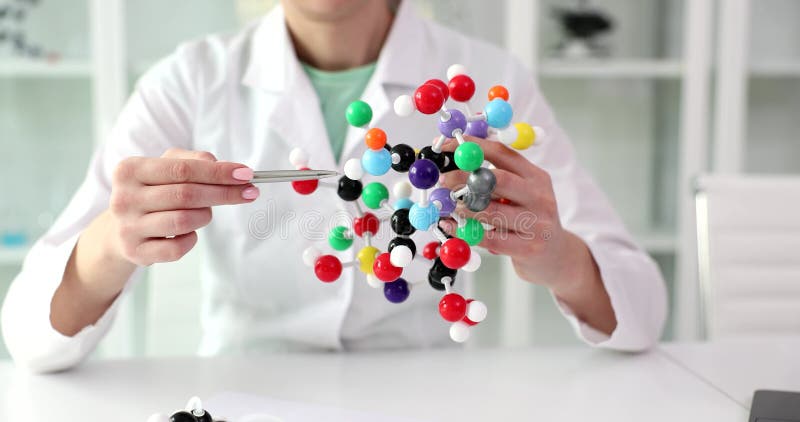 Scientist Looks at Model of Molecular Structure Stock Footage - Video ...