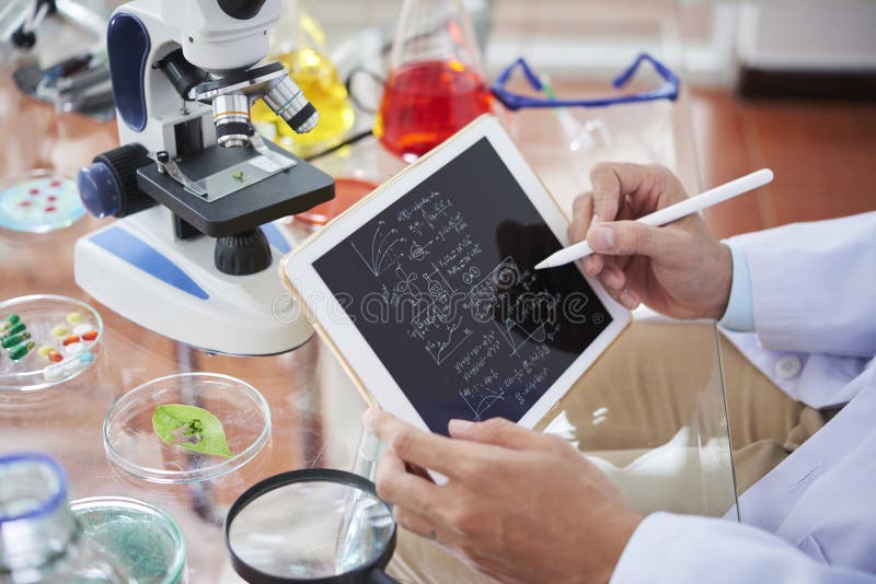 Scientist Making Calculations Stock Image - Image of microscope ...