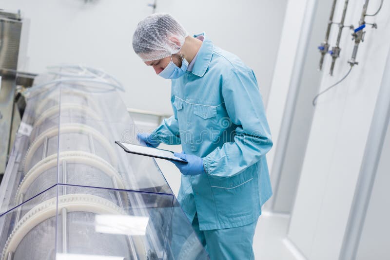Scientist Making Notes about Machine Stock Photo - Image of industrial ...