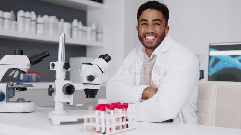 Scientist, Man Face and Microscope Blood Sample in a Laboratory for ...