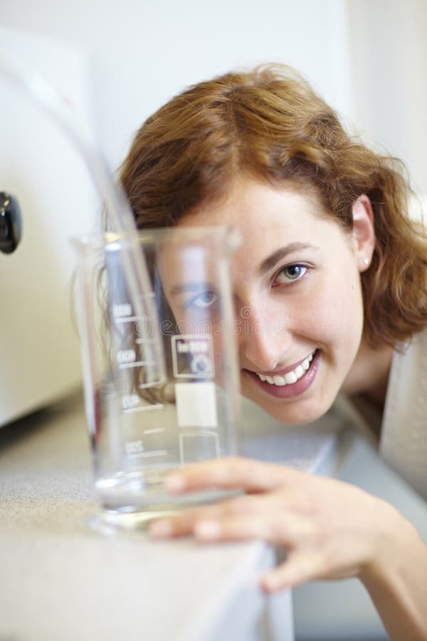Scientist with Measuring Cup Stock Image - Image of glass, coat: 12105815