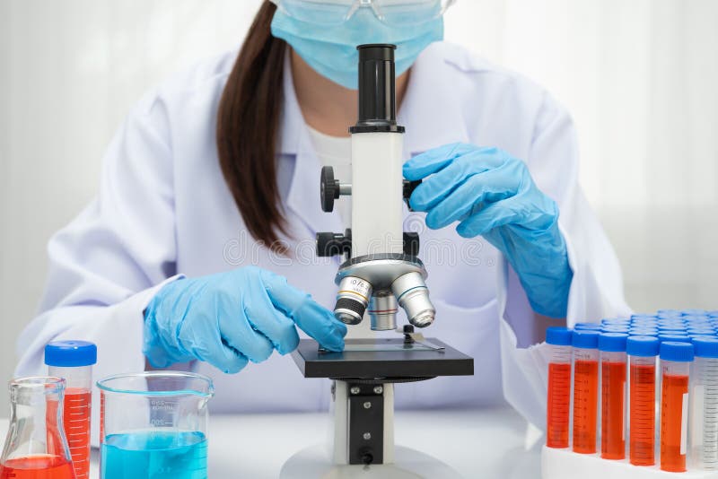 Scientist Medical Professional Use Microscope for Research in Science Laboratory Stock Image ...