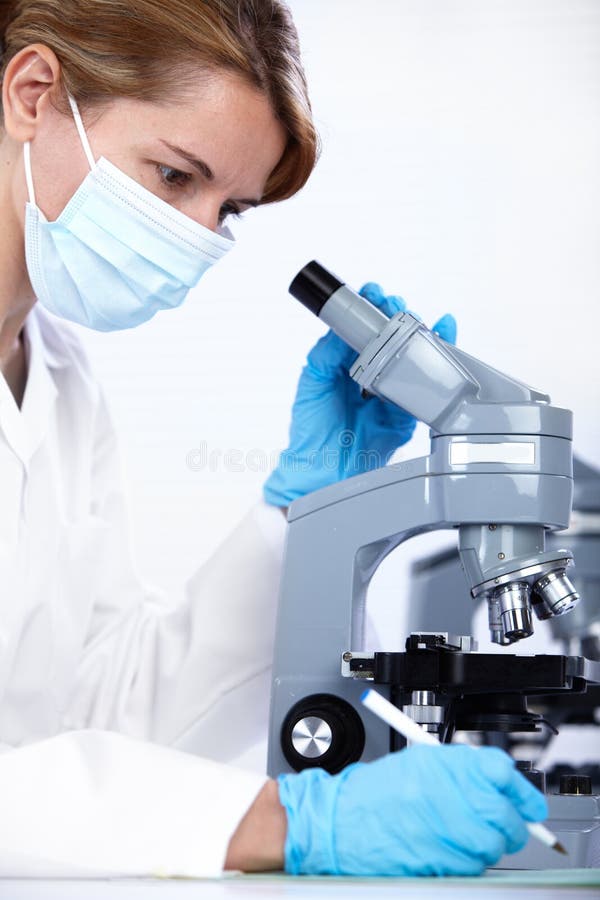 Scientist Working with Microscope Stock Photo - Image of health ...