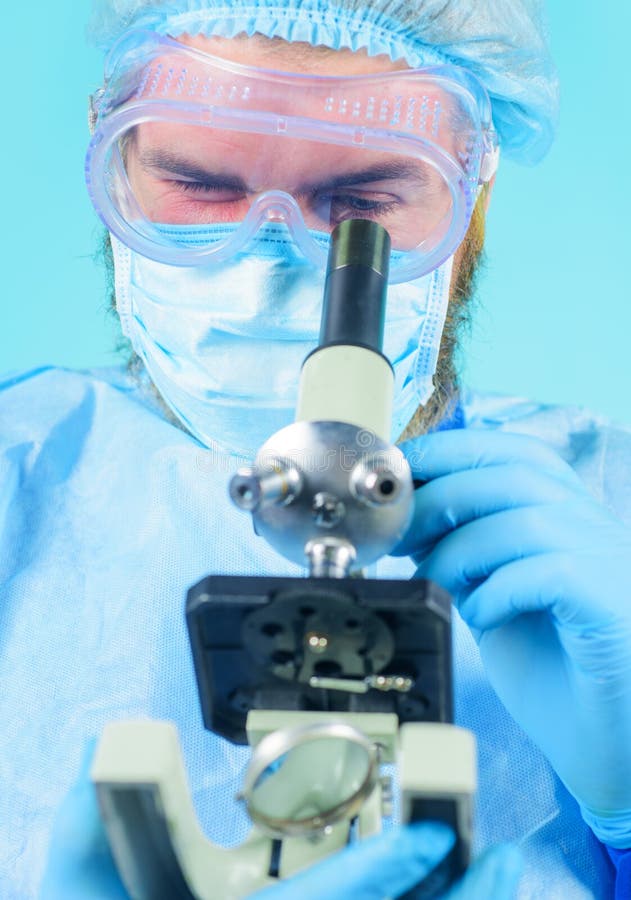 Scientist with Microscope Making Test or Research. Doctor Using ...