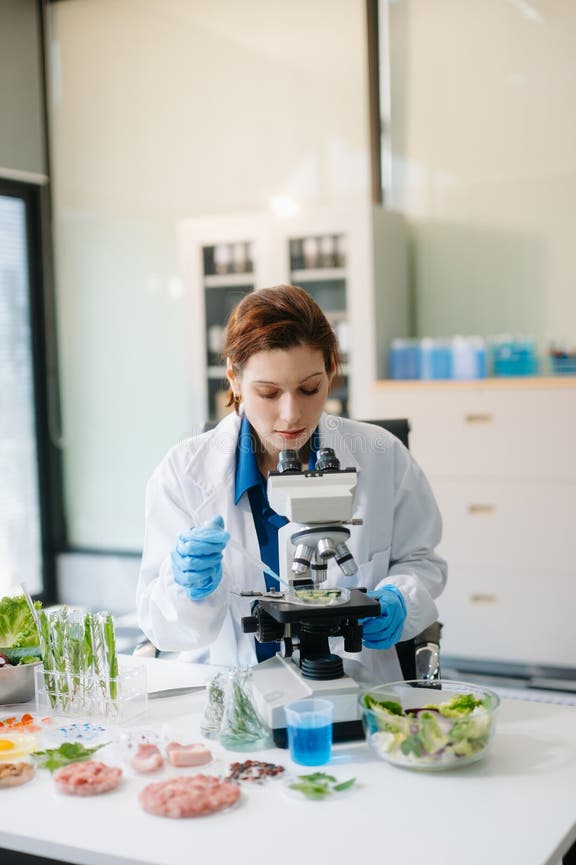 Scientist in a Modern Lab Analyzing Food Samples with Advanced ...