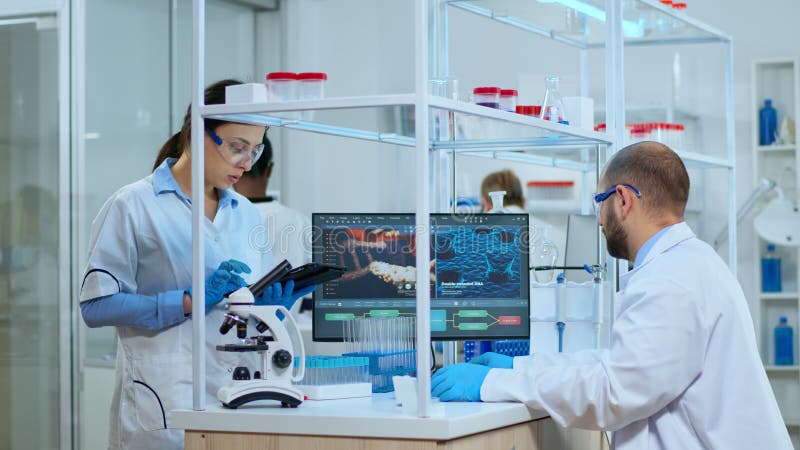 Scientist Nurse Taking Notes on Tablet in Laboratory Stock Image ...