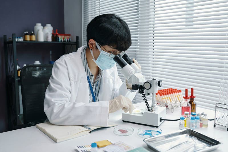 Scientist Observing Specimen Microscope Laboratory Setting Stock Photos ...