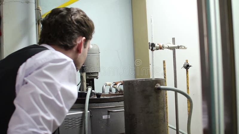 Scientist Opens the Lid Device To Control the Experiment Process Stock ...