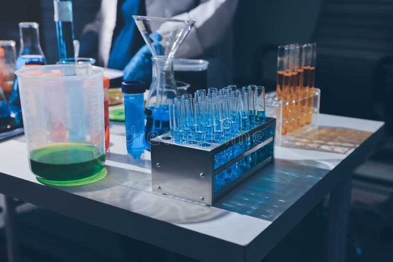 Scientist Pipetting Medical Samples into Microplate in Laboratory Stock ...