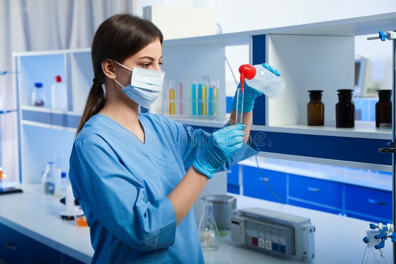 Scientist Pouring Liquid into Test Tube. Laboratory Analysis Stock ...