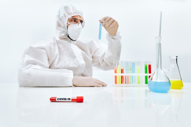 Scientist in PPE Working in Lab Making Microbiology Research Against ...