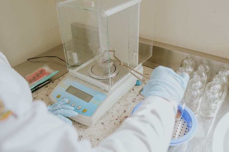 Scientist Preparing Soil Extract at Table. Laboratory Analysis Stock ...