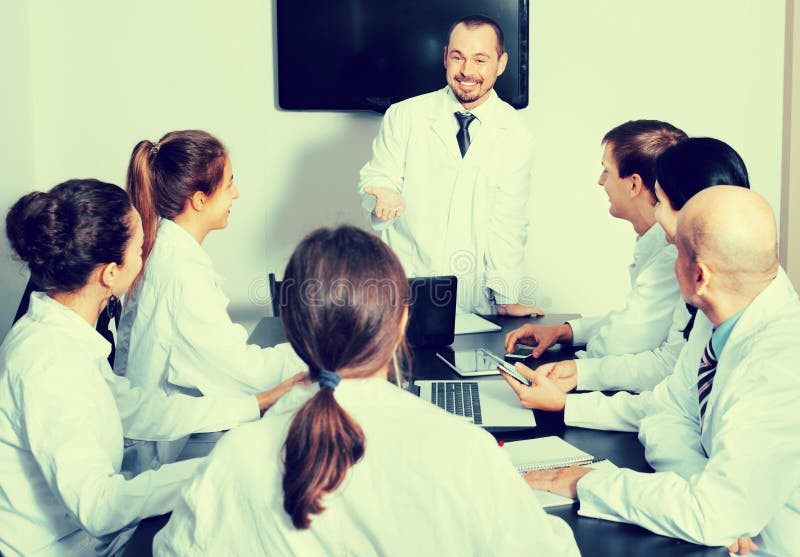 Scientist Presenting Report during Working Meeting Stock Image - Image ...