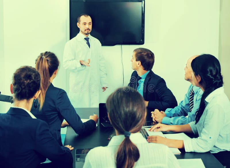 Scientist Presenting Report during Working Meeting Stock Image - Image ...