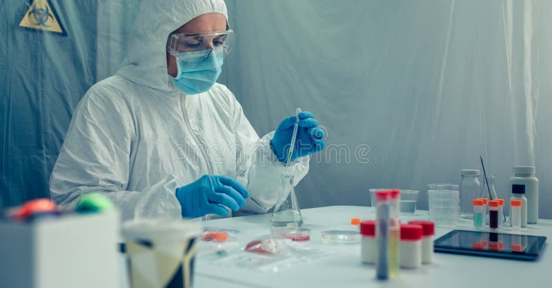 Scientist with Protection Suit Doing Research in the Laboratory Stock ...