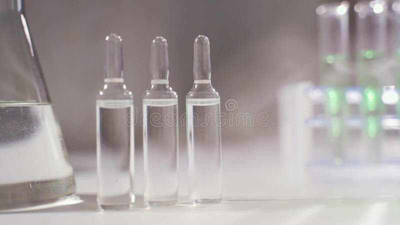 Scientist are Putting Test-tubes in Liquid Nitrogen in a Laboratory ...