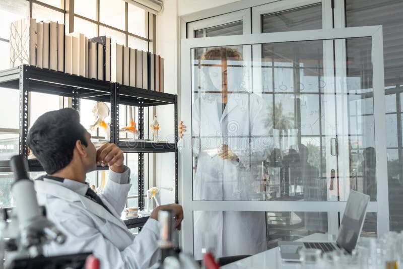Scientist Researcher Doing Experiments in Modern Laboratory. Science ...