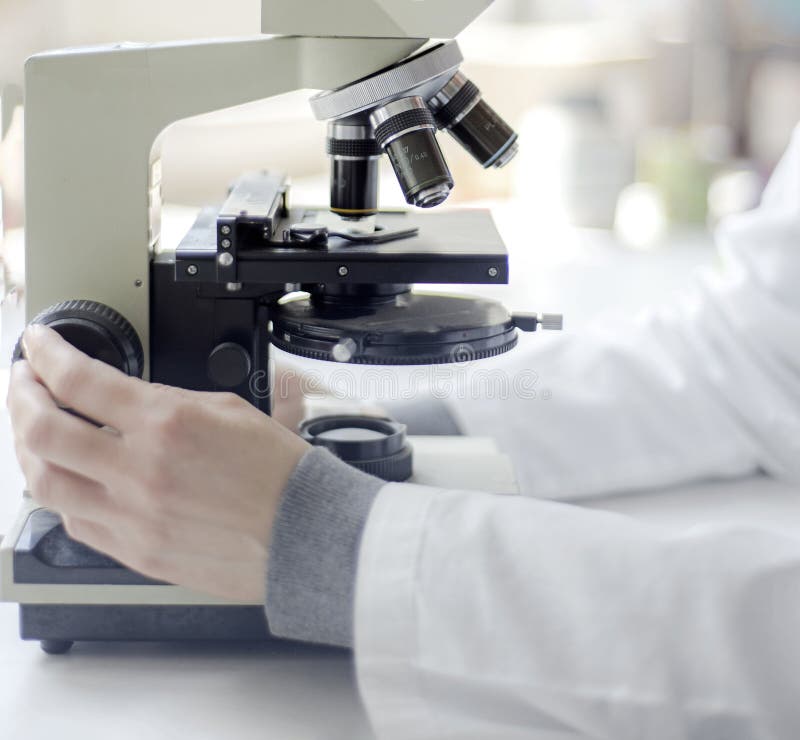 Scientist Researcher Using Microscope in Laboratory. Medical Healthcare ...