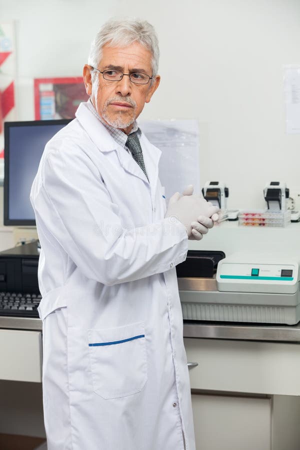 Scientist Standing by Analyzer in Lab Stock Image - Image of medical ...