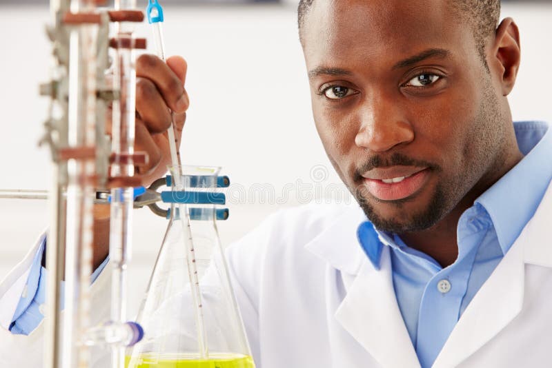 Scientist Studying Liquid in Flask Stock Photo - Image of glass ...