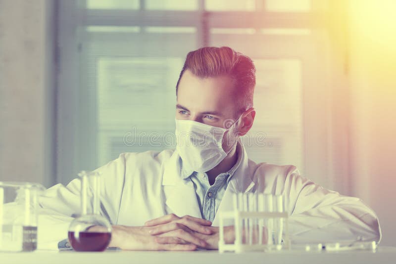 Scientist at the Table in the Sunny Laboratory Stock Photo - Image of ...