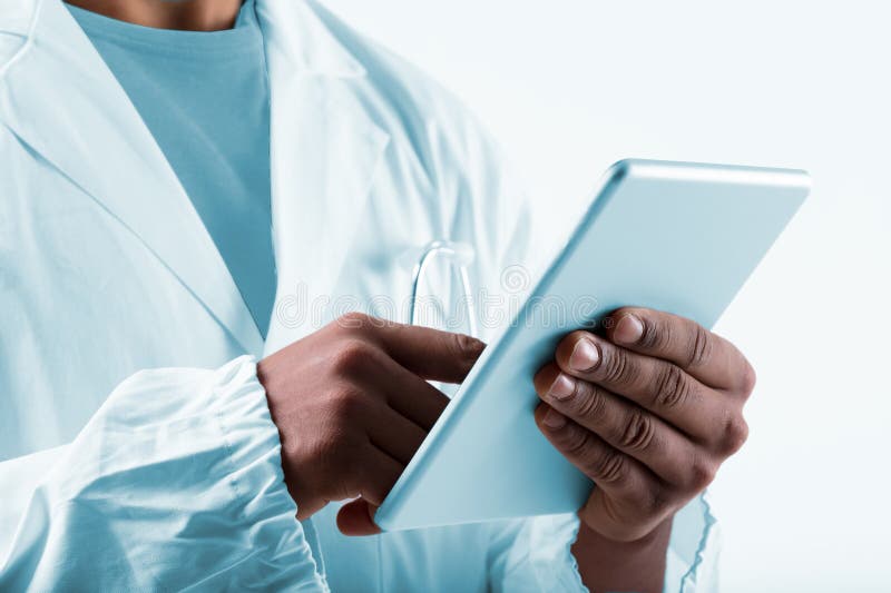 Scientist with Tablet Analyzes Data, Collaborates Online Stock Photo ...