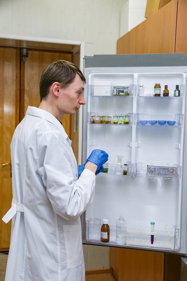 Scientist is Taking Samples from the Fridge Stock Photo - Image of ...