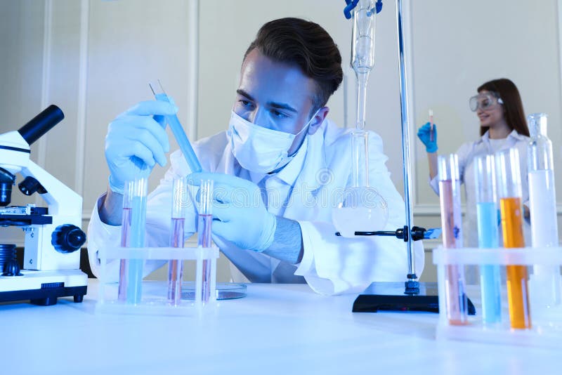 Scientist Taking Test Tube from Rack. Laboratory Analysis Stock Photo ...