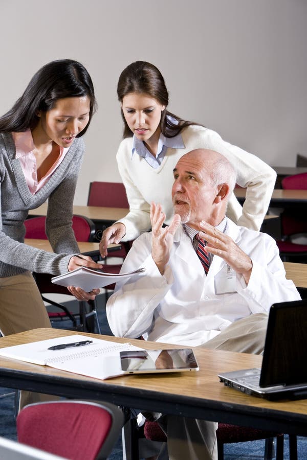 Scientist Talking To Assistants in Conference Room Stock Photo - Image ...