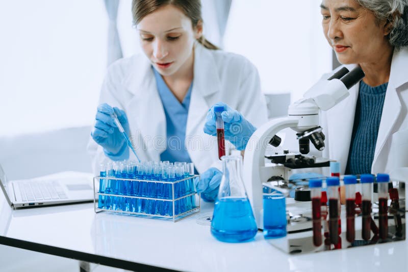 Scientist Team Meeting and Writing Analysis Results in the Laboratory Study and Analyze ...