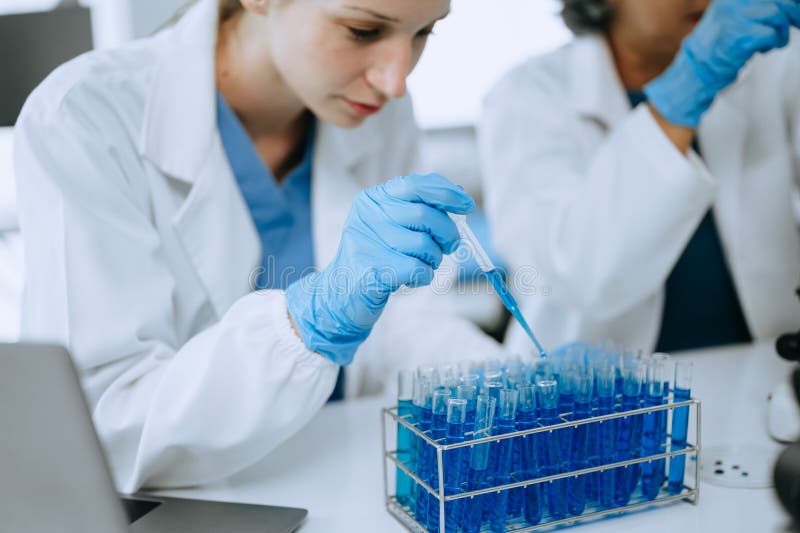 Scientist Team Meeting and Writing Analysis Results in the Laboratory ...