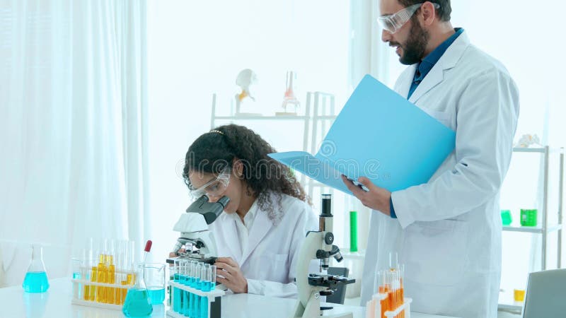 Scientist Team Use Microscope in the Lab Stock Photo - Image of medical ...