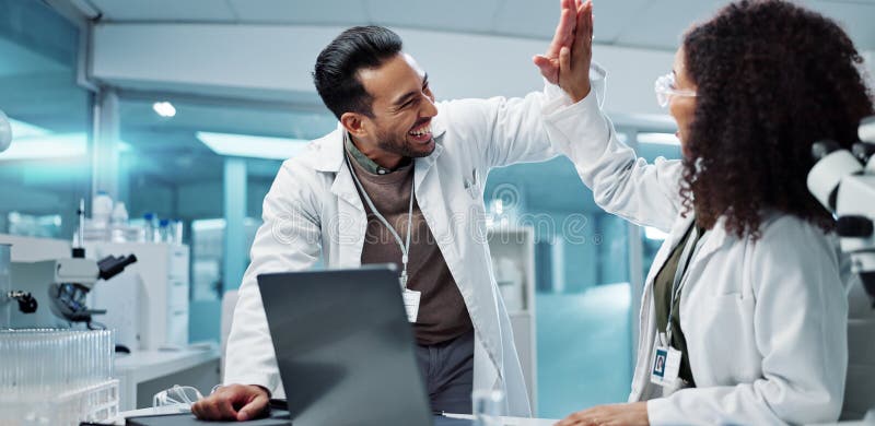 Scientist, Teamwork and High Five with Laptop in Laboratory for Test ...