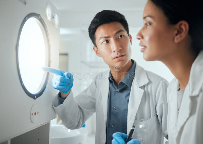 Scientist with a Test Tube Working at the Laboratory Stock Image ...
