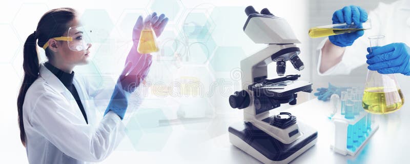 Scientist is Testing and Doing Lab Sample with Microscope in La Stock ...
