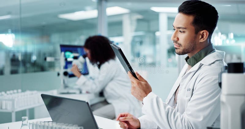 Scientist, Thinking on Computer and Tablet for Laboratory Research, DNA ...