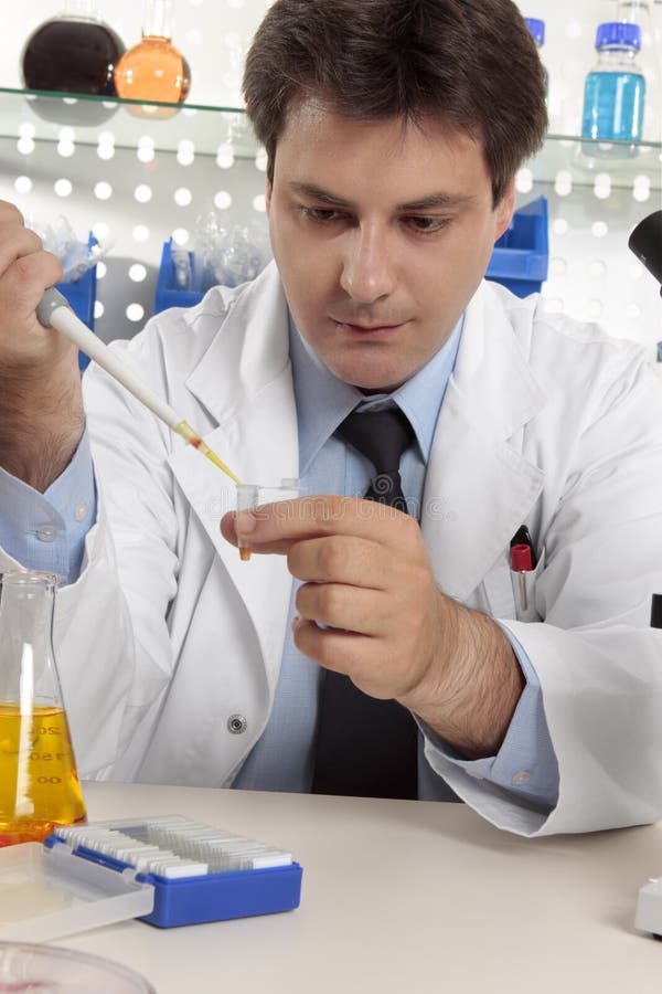 Scientist Using Pipette in Lab Stock Image - Image of technician ...