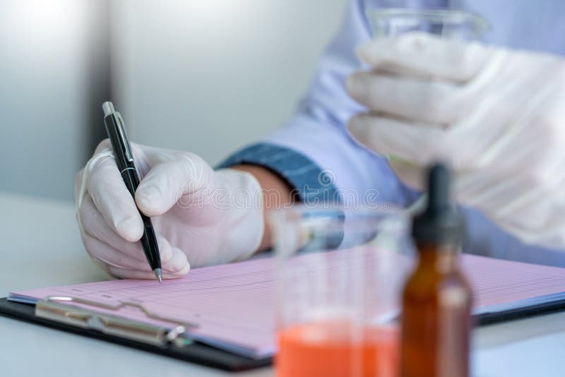 Scientist Wear Lab Coat and Protective Wear are Working with Research ...