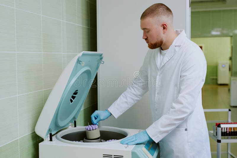 Scientist Utilizing Equipment in Modern Laboratory Setting Stock Image ...