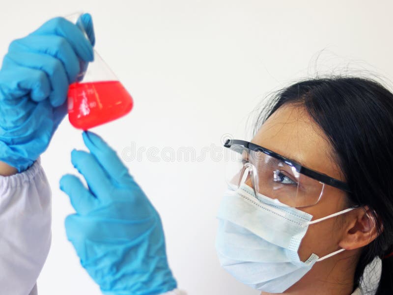 The Erlenmeyer Flask on Bench Laboratory, with Bright Pink Solvent ...