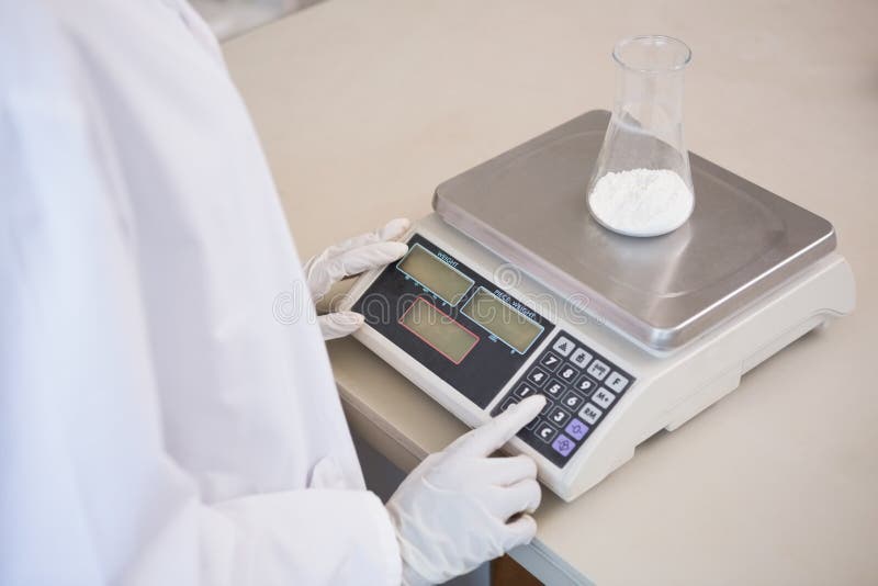Scientist Weighing Beaker with White Powder Inside Stock Image - Image ...